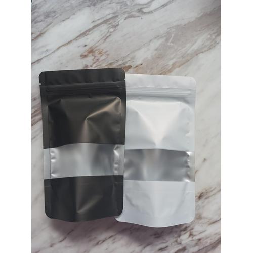 Jual PLASTIK STANDING POUCH METALIZE WINDOW HITAM / PUTIH + ZIP - 12X20 ...