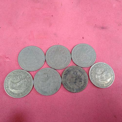Jual uang koin 100 rupiah gambar wayang atau gunungan dan rumah adat ...