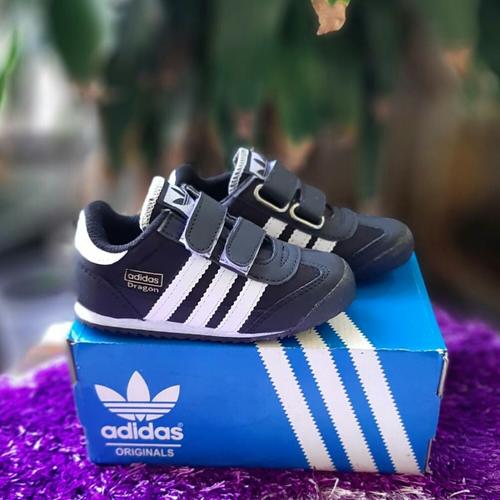 Jual sepatu sekolah anak TK SD sneakers dragon hitam putih size 26-35 ...