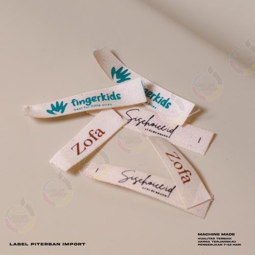 Jual 2cm Label baju/label merek/label piterban cream label fashion ...