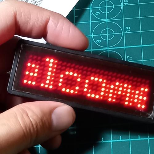 Jual Red Name Tag Running Text Bros Pin 20 Messages x 120 Characters ...