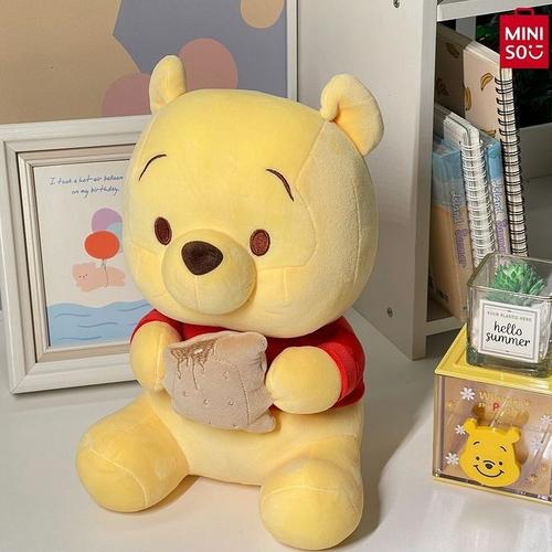 Jual Boneka Winnie The Pooh Lucu - MINISO Sitting Holding Biscuit Plush ...