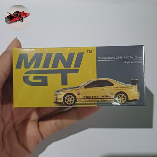 Jual Mini GT 676 Nissan Skyline R34 Top Secret Gold Japan Exclusive ...