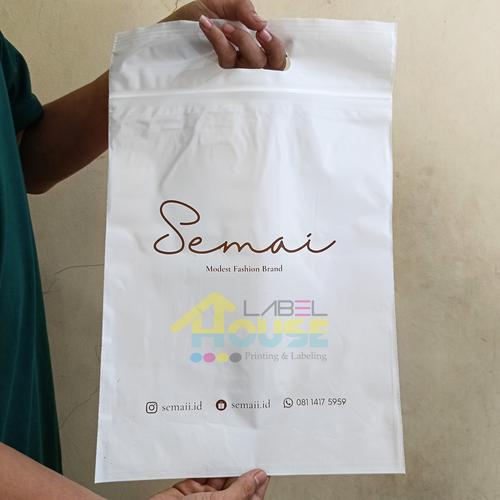 Jual Plastik Packing Baju | Sablon Plastik KLIP POND | Plastik Sablon ...