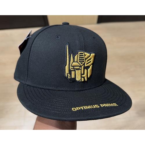 Jual Topi New Era 59Fifty x Transformers Optimus Prime Black Fitted Cap ...