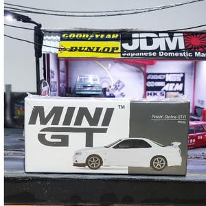 Jual Mini GT Nissan Skyline GT-R R34 V-Spec N1 White 397 - Kota Bandar ...