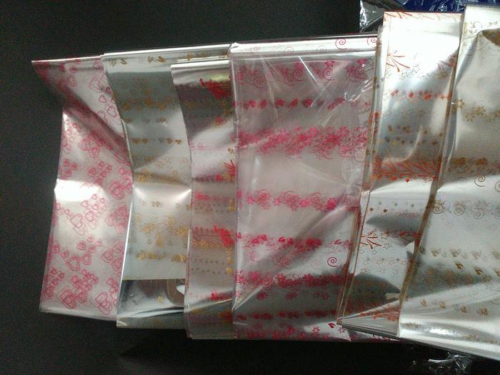 Jual Plastik Bungkus Parcel Lembaran Motif Plastik Kado Kaca Bening ...
