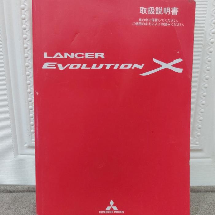 Jual manual book mitsubishi evo X / buku pedoman pemilik evo X original ...