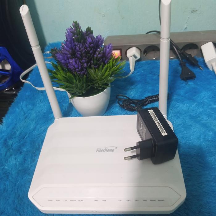 Jual fiberhome polos + adaptor (hg6243c) Gpon Onu - Kab. Bekasi ...