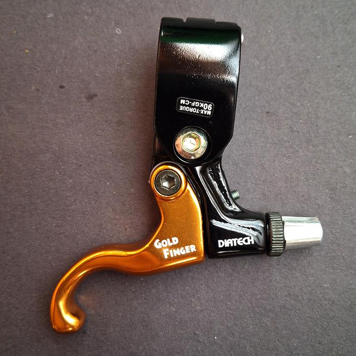 Jual Brake lever Gold finger Diacompe Black gold - Jakarta Timur ...
