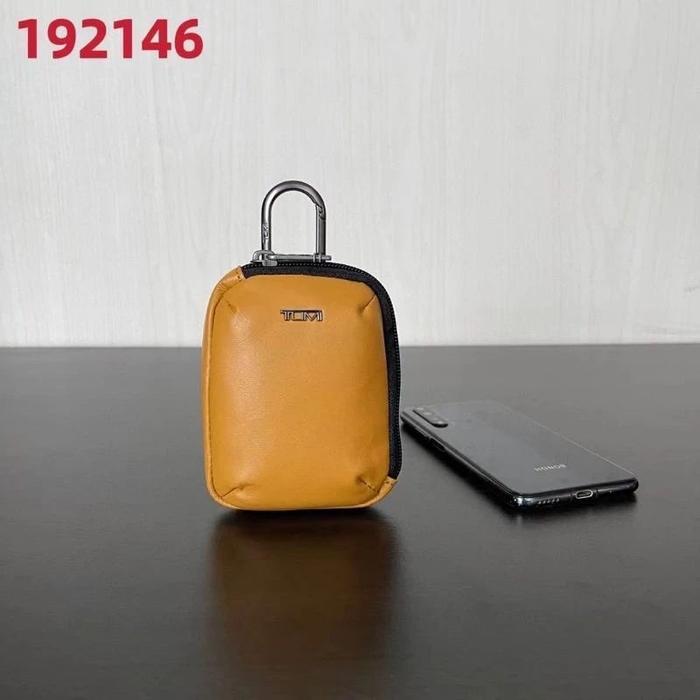 Jual T U M I ACCESORIES SMALL POUCH BAG - Kuning Leather - Jakarta ...