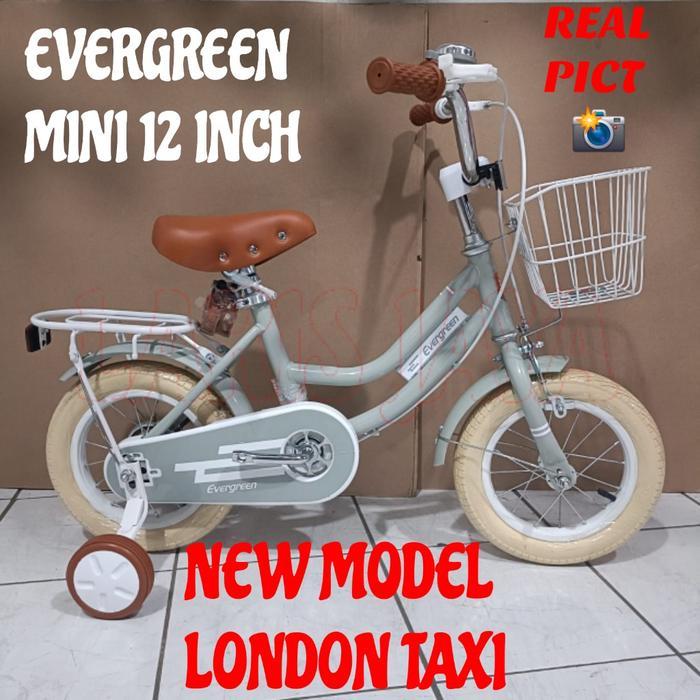 Jual Sepeda perempuan Mini 12 inch Evergreen Penguin Keranjang TERBARU ...